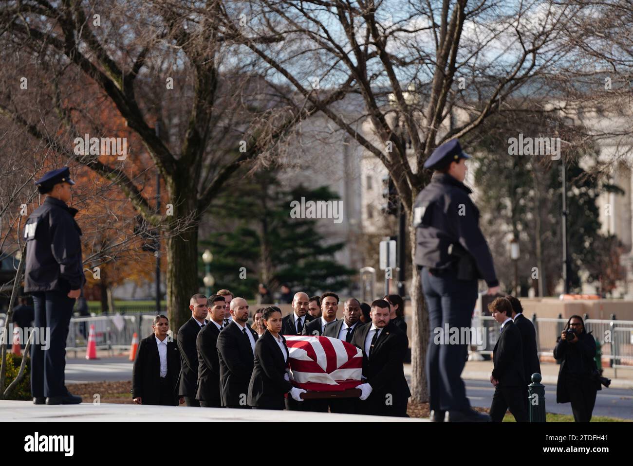 Washington, United States. 18th Dec, 2023. The flag-draped casket of ...