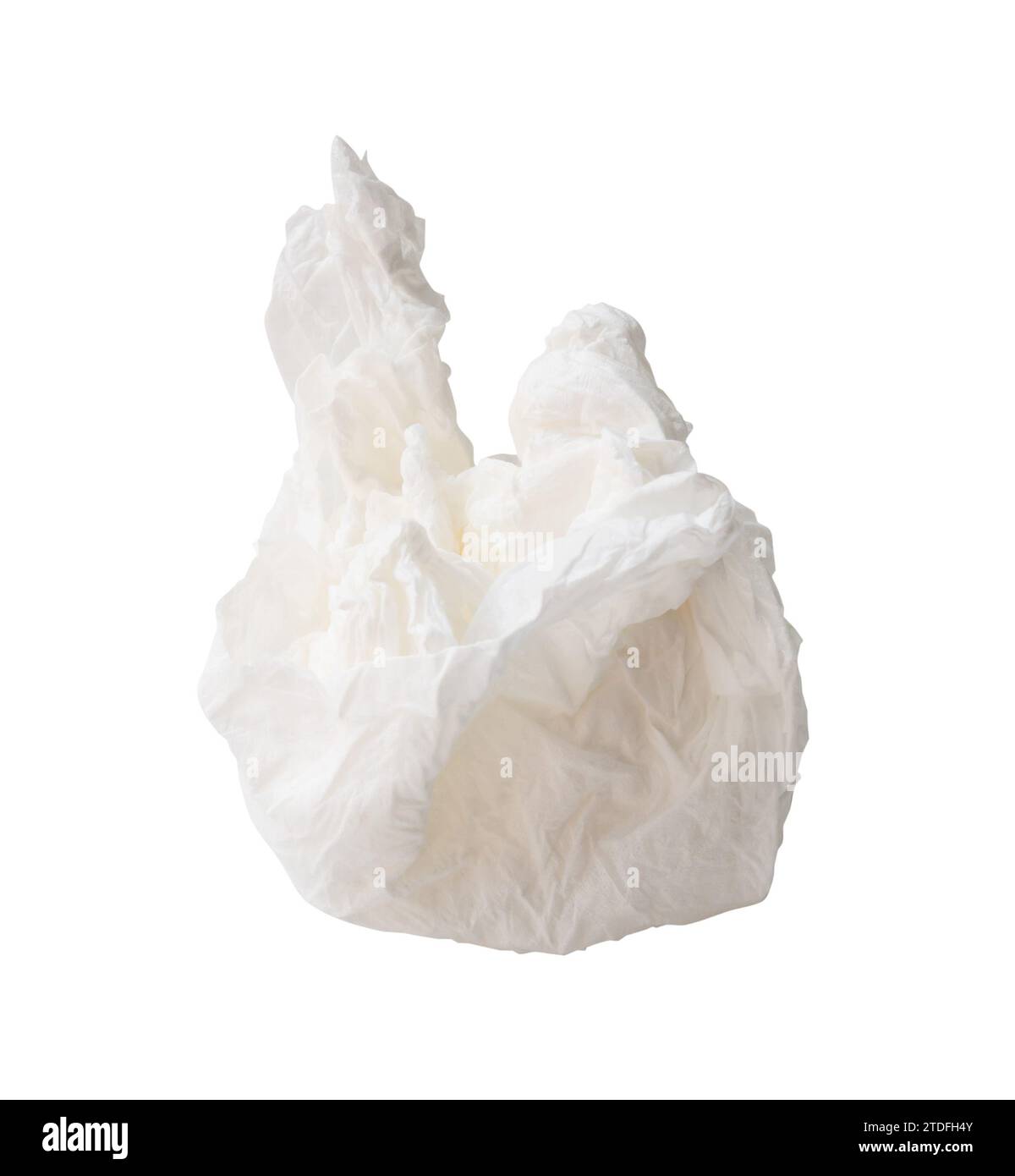 Single screwed or crumpled tissue paper or napkin in strange shape ...