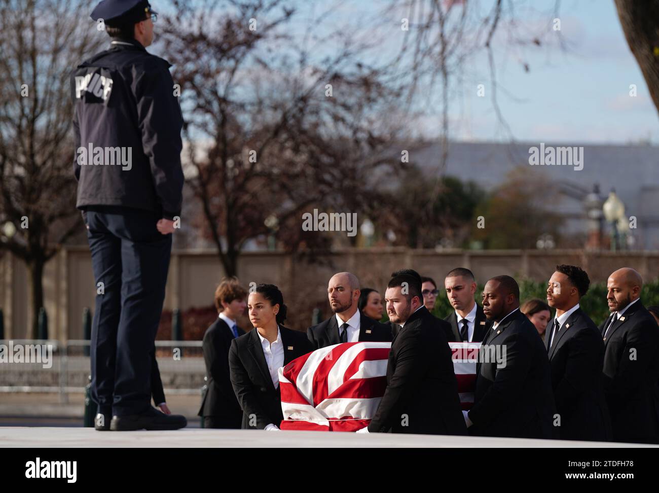 Washington, United States. 18th Dec, 2023. The flag-draped casket of ...