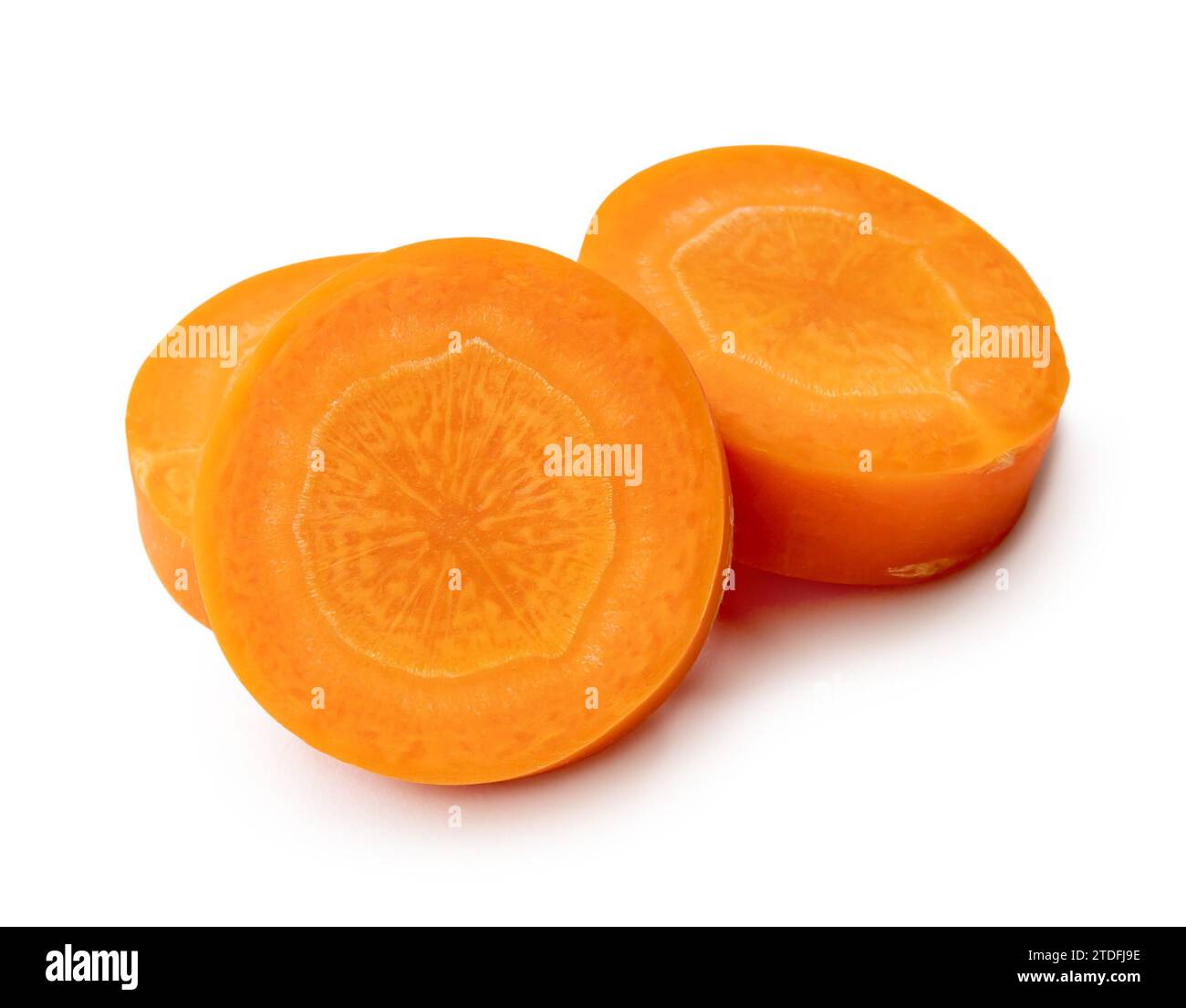Beautiful orange carrot slices in stack are isolated on white ...