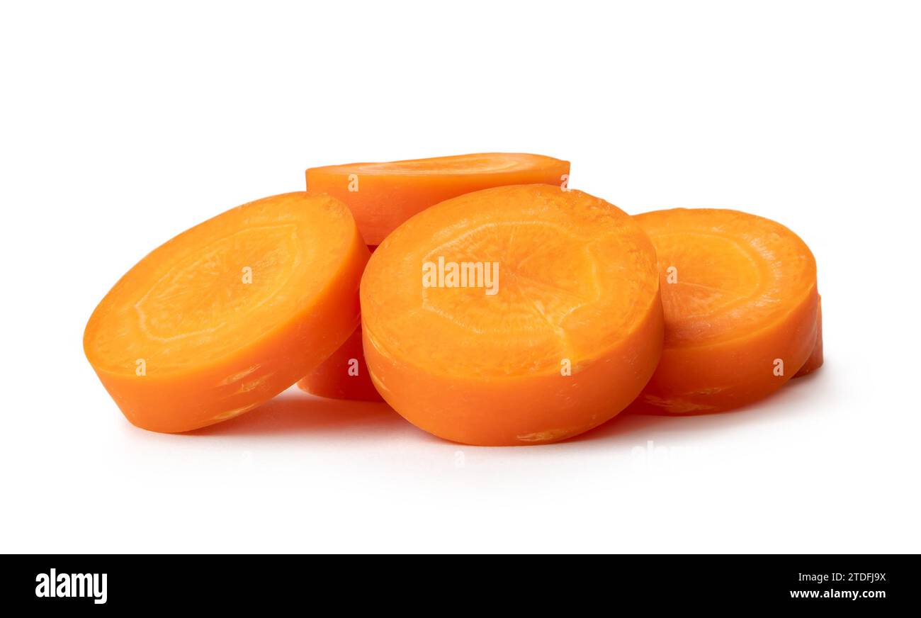 Beautiful orange carrot slices in stack are isolated on white ...