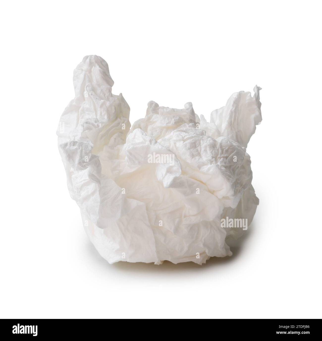 Single screwed or crumpled tissue paper or napkin in strange shape ...