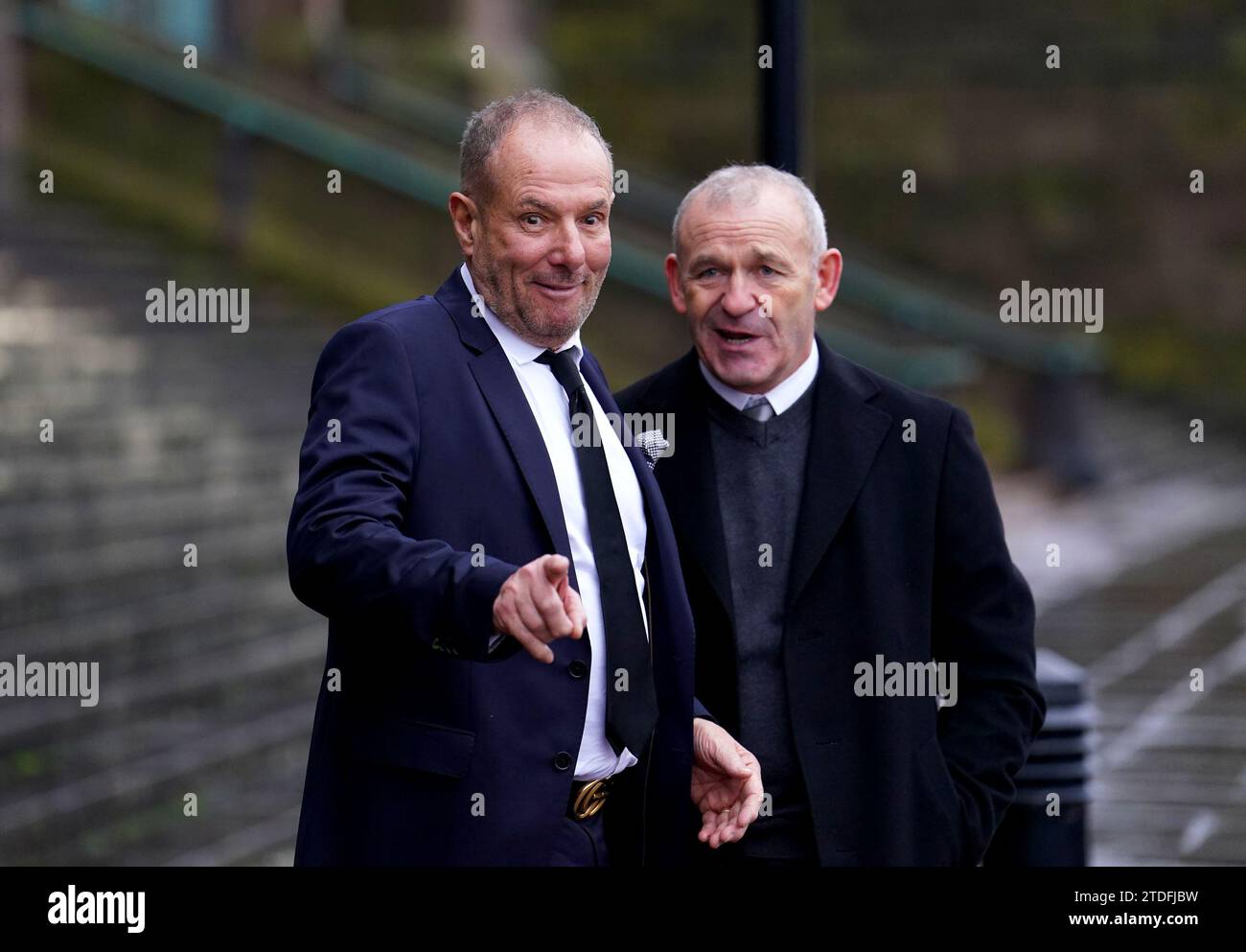 Derek Hatton (left) and former footballer Shaun Reid arrive ahead of a ...