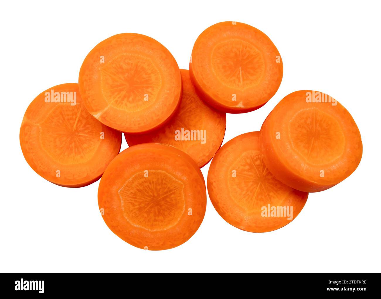 Fresh beautiful carrot slices in stack are isolated on white background ...