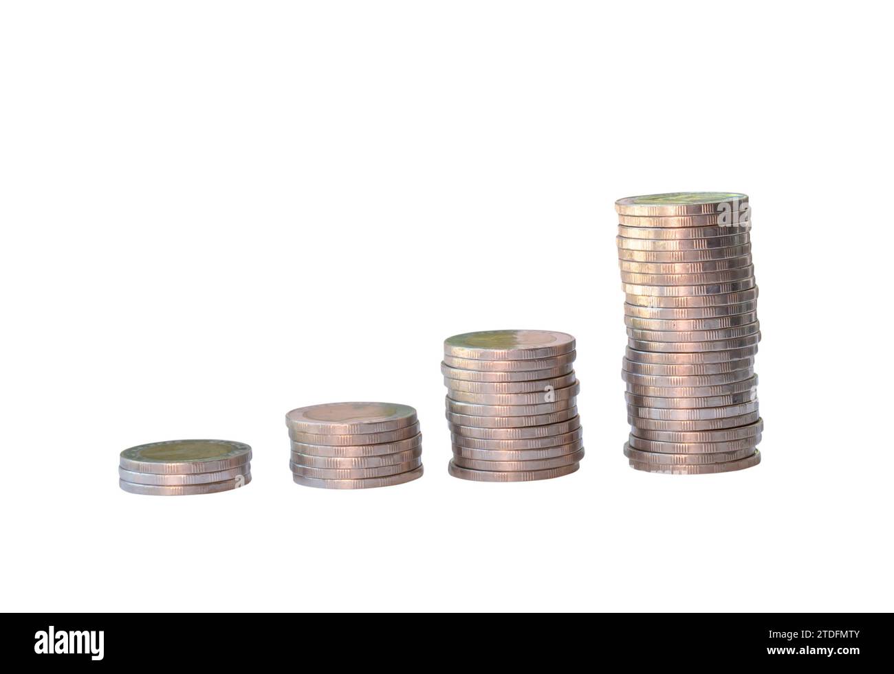 Silver coins in separated stacks are isolated on white background with ...