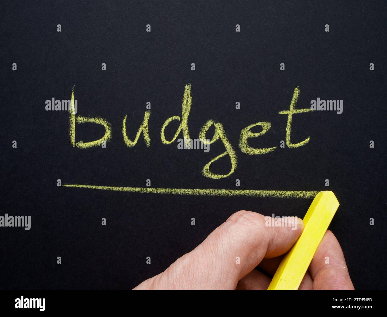 Handwritten chalk word budget. Financial planning Stock Photo - Alamy