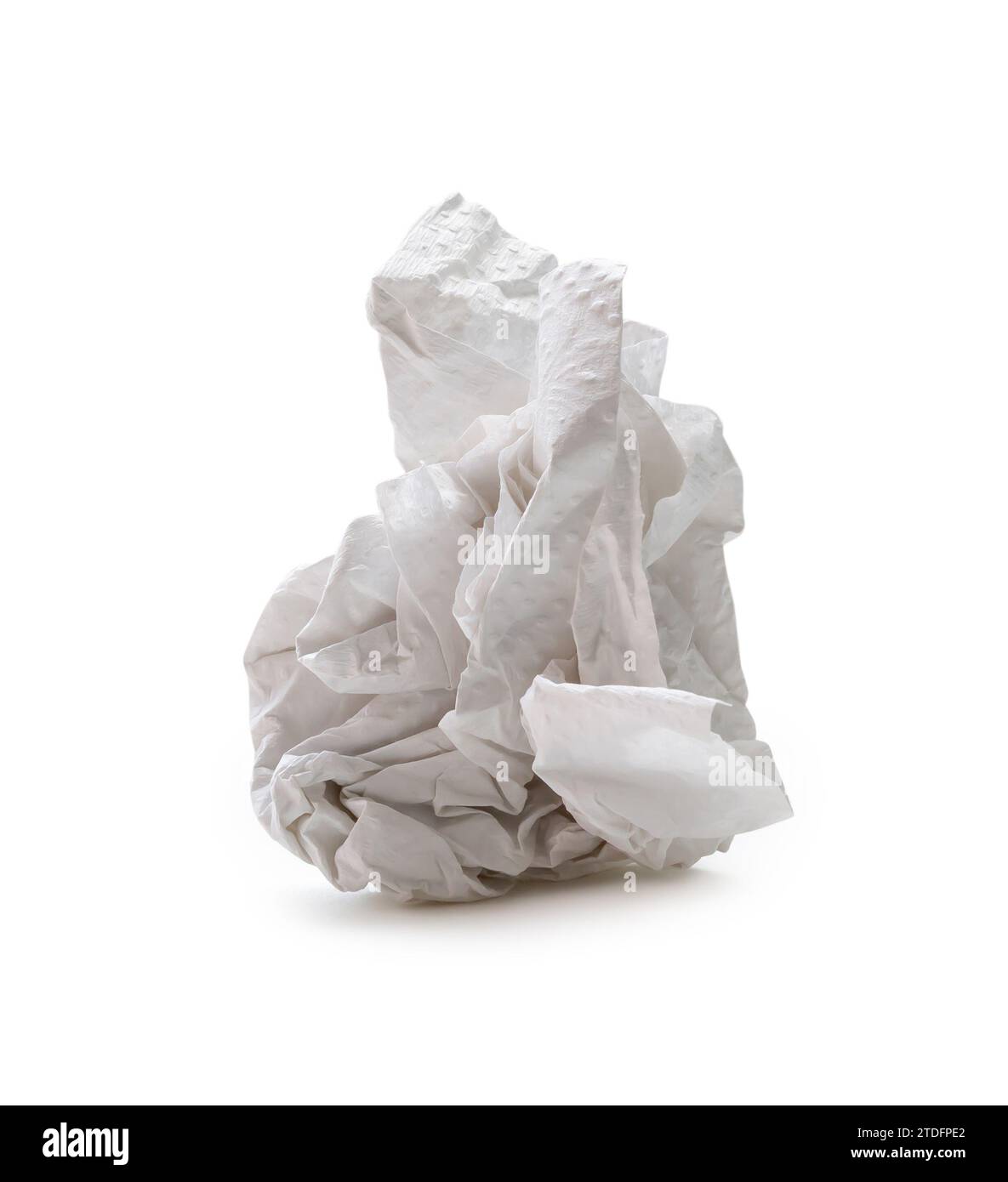 Single screwed or crumpled tissue paper or napkin in strange shape ...