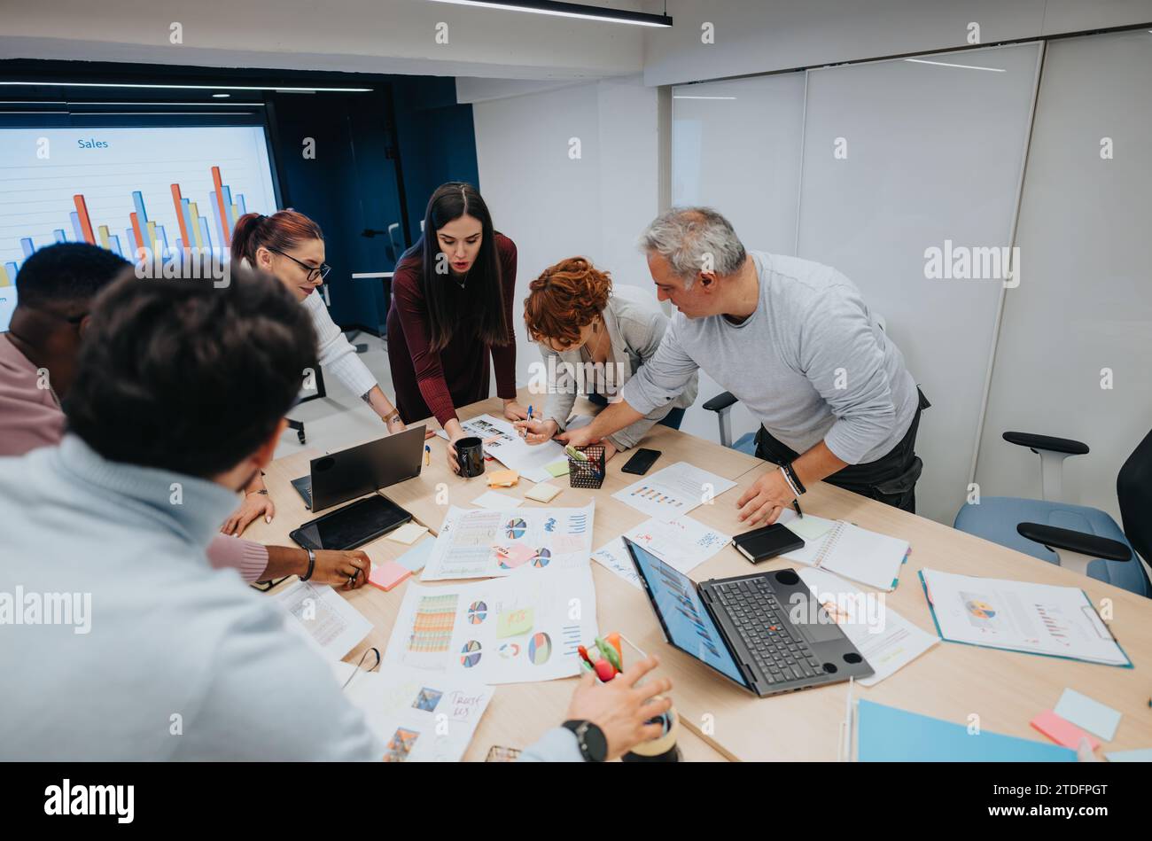 Successful businesspeople attending a dynamic business lecture Stock ...