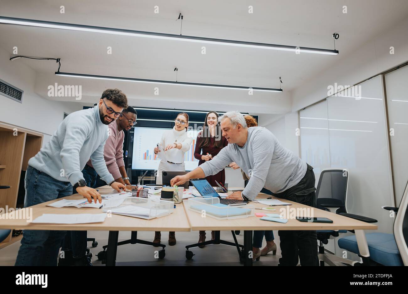 Business professionals collaborating and sharing ideas in a dynamic ...