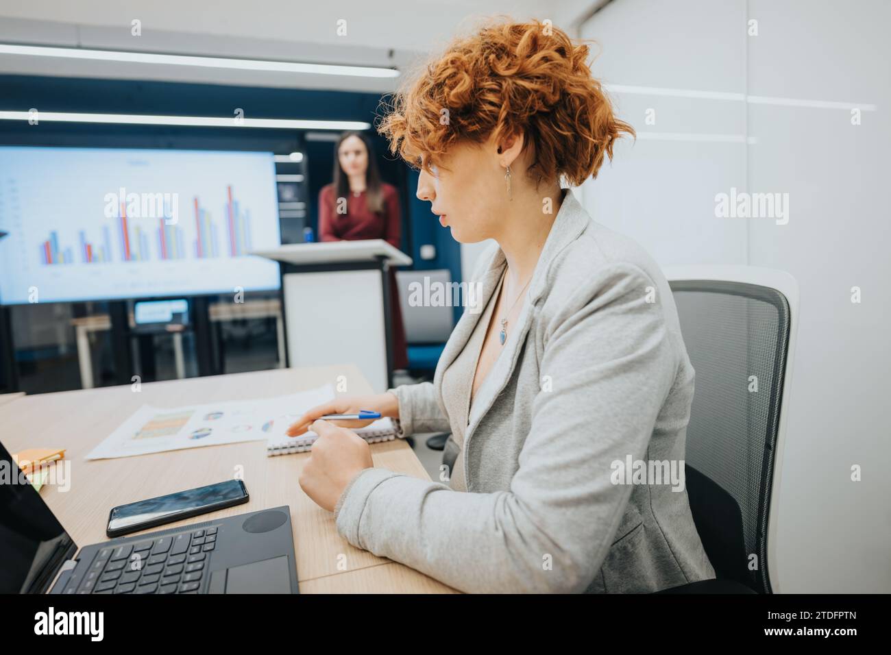 Business team collaborating in classroom workshop Stock Photo - Alamy