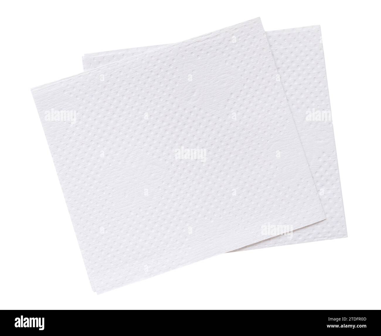 Top view of two folded pieces of white tissue paper or napkin in stack ...