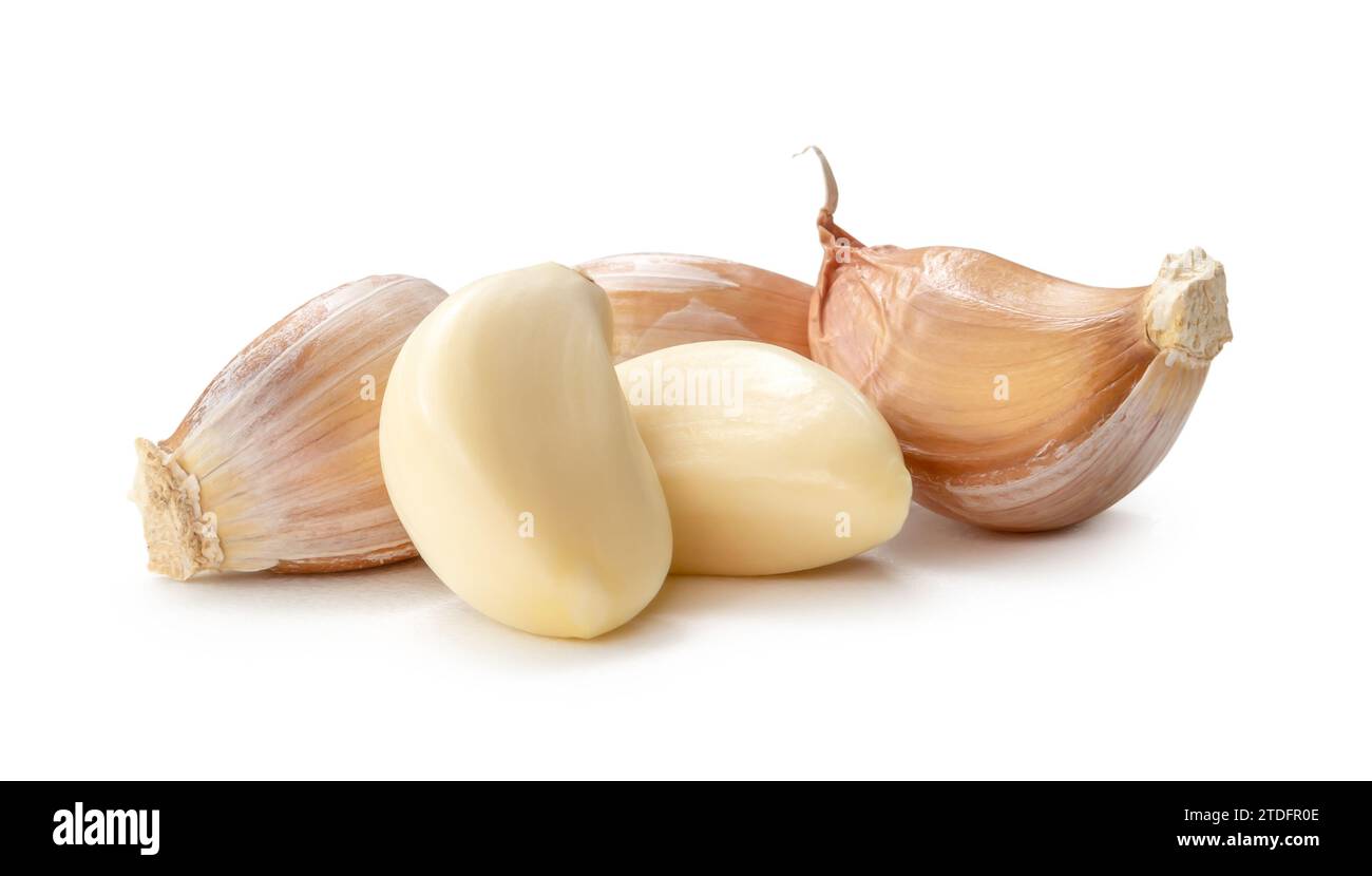 Fresh three garlic cloves in stack are isolated on white background ...