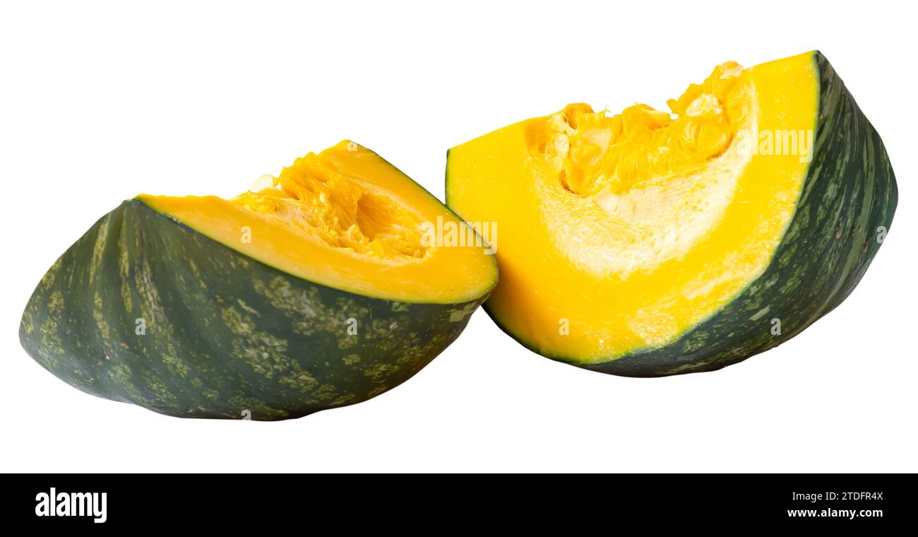 Two slices of green japanese pumpkin are isolated on white background ...