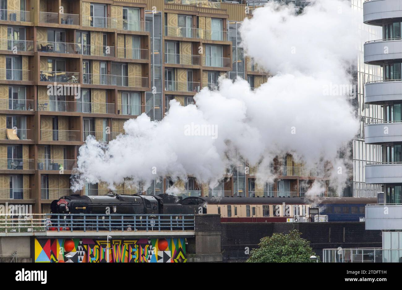 © Jeff Moore The Santa Steam Express train passes the iconic Battersea ...