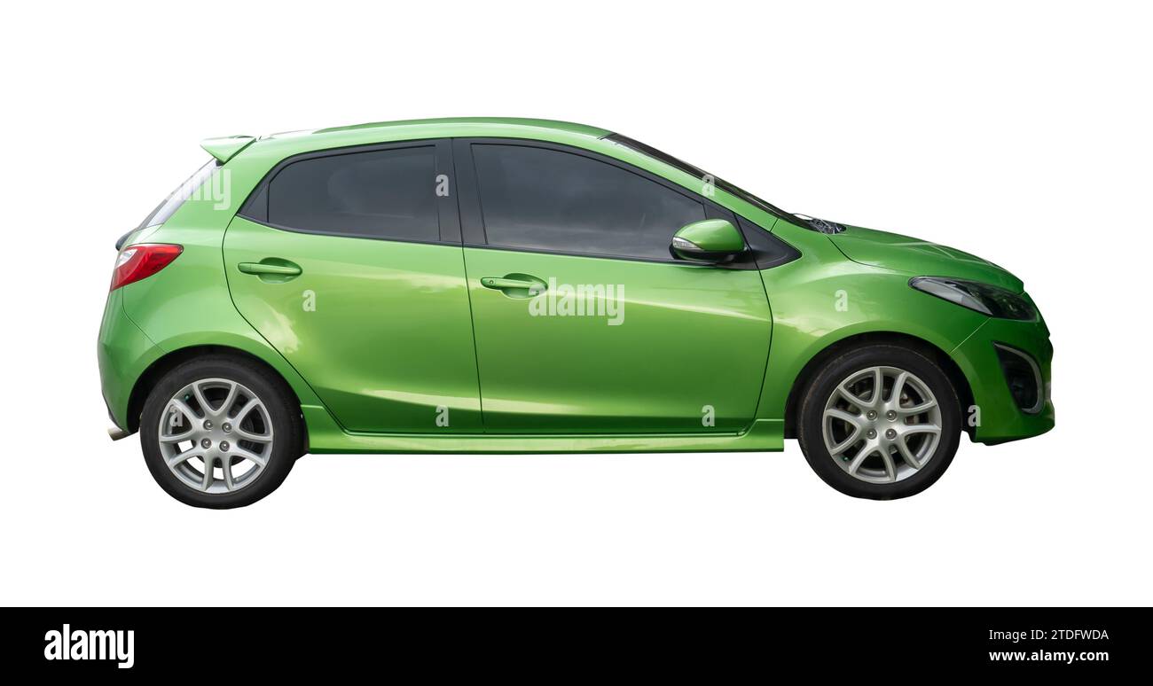 green hatchback car is isolated on white background with clipping path ...