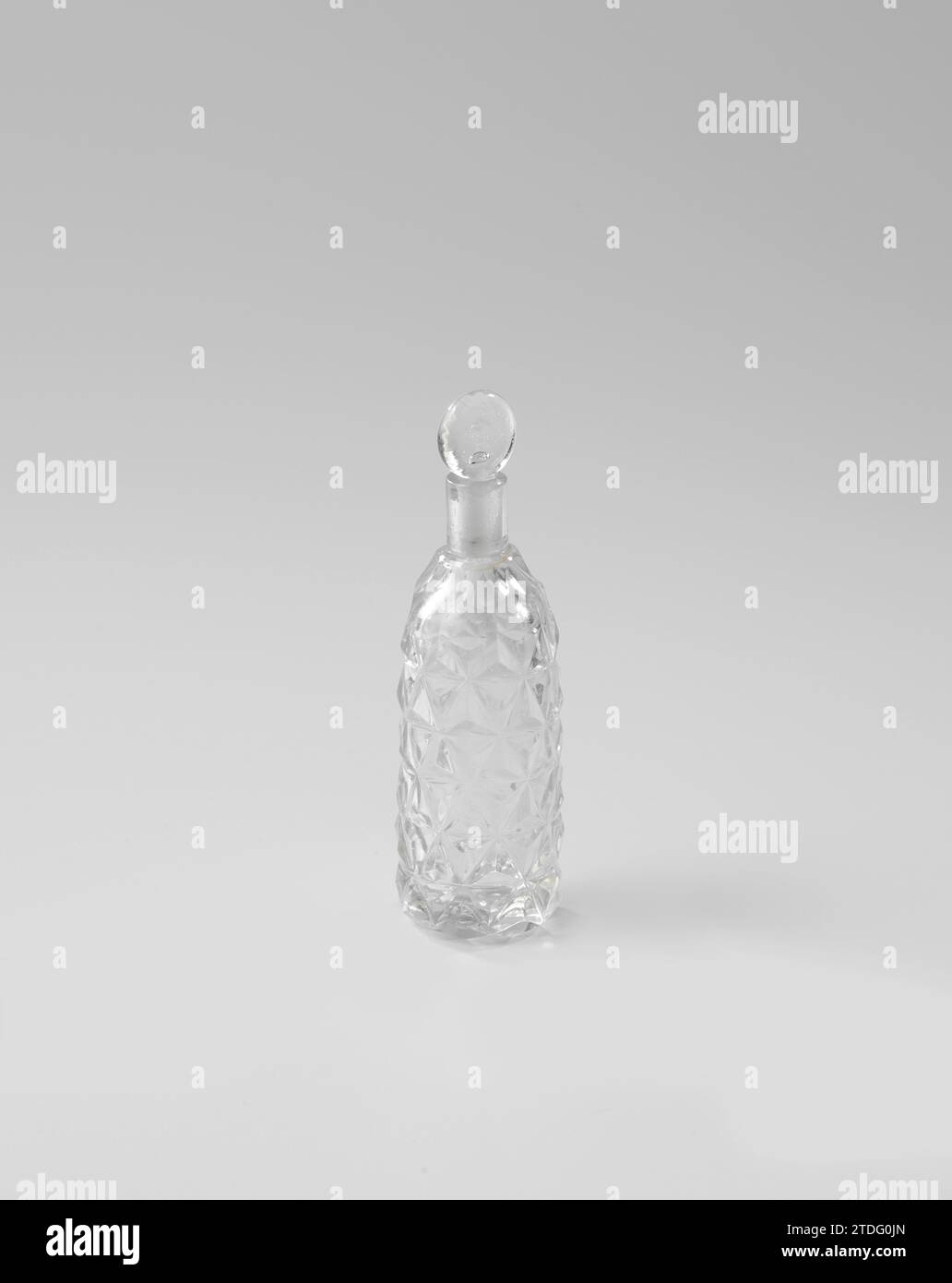 Perfume bottle, with cut 'pointed' or 'sharp' stones, with a round stop ...