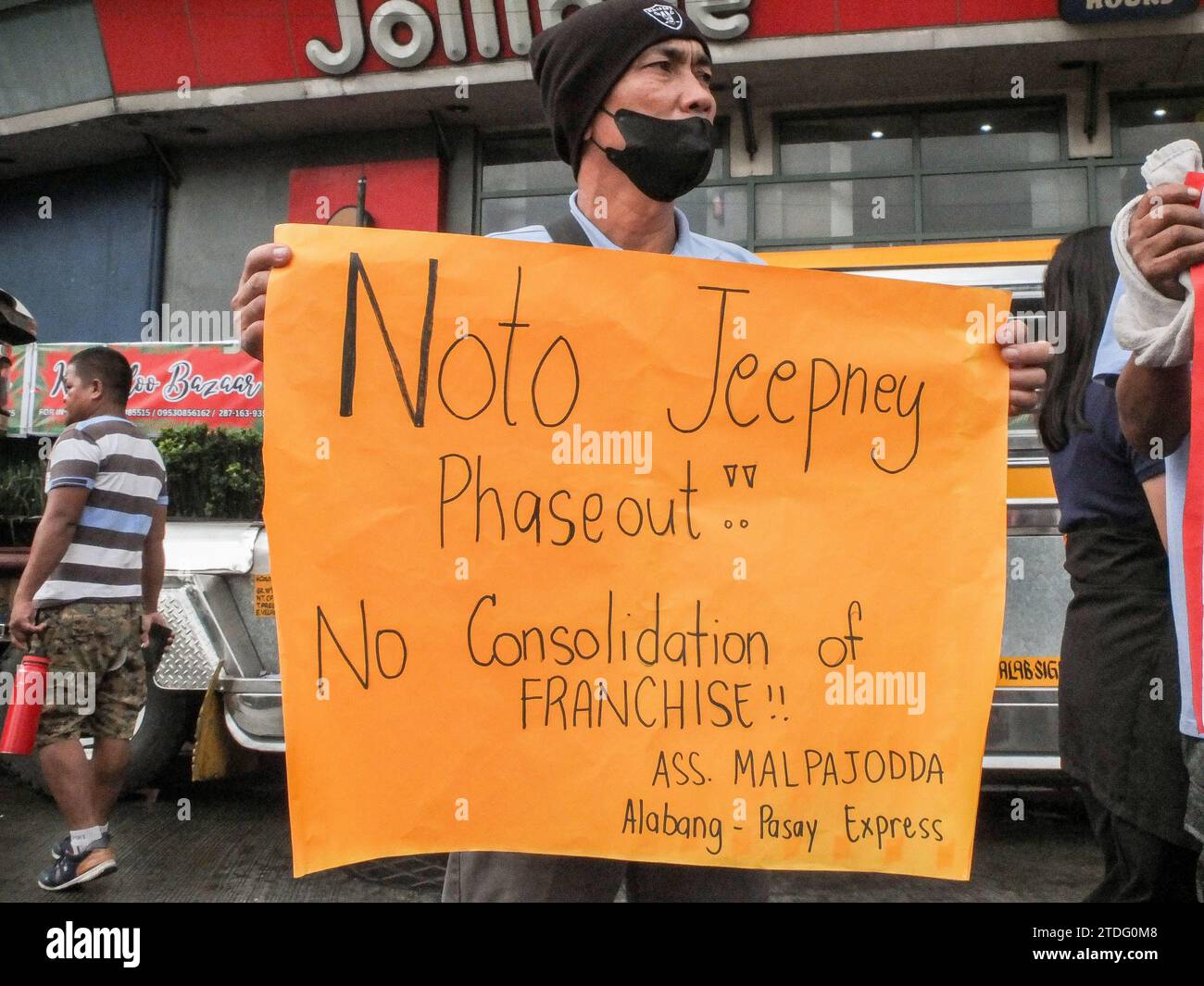 Caloocan City, Philippines. 18th Dec, 2023. A protester holds a placard ...