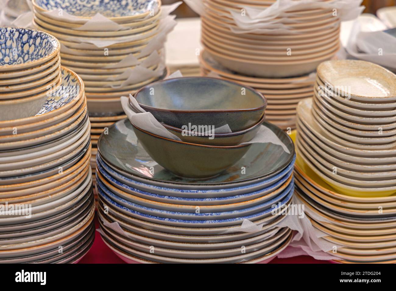 Stack of New Ceramic Bowls and Plates Modern Dinnerware Stock Photo - Alamy