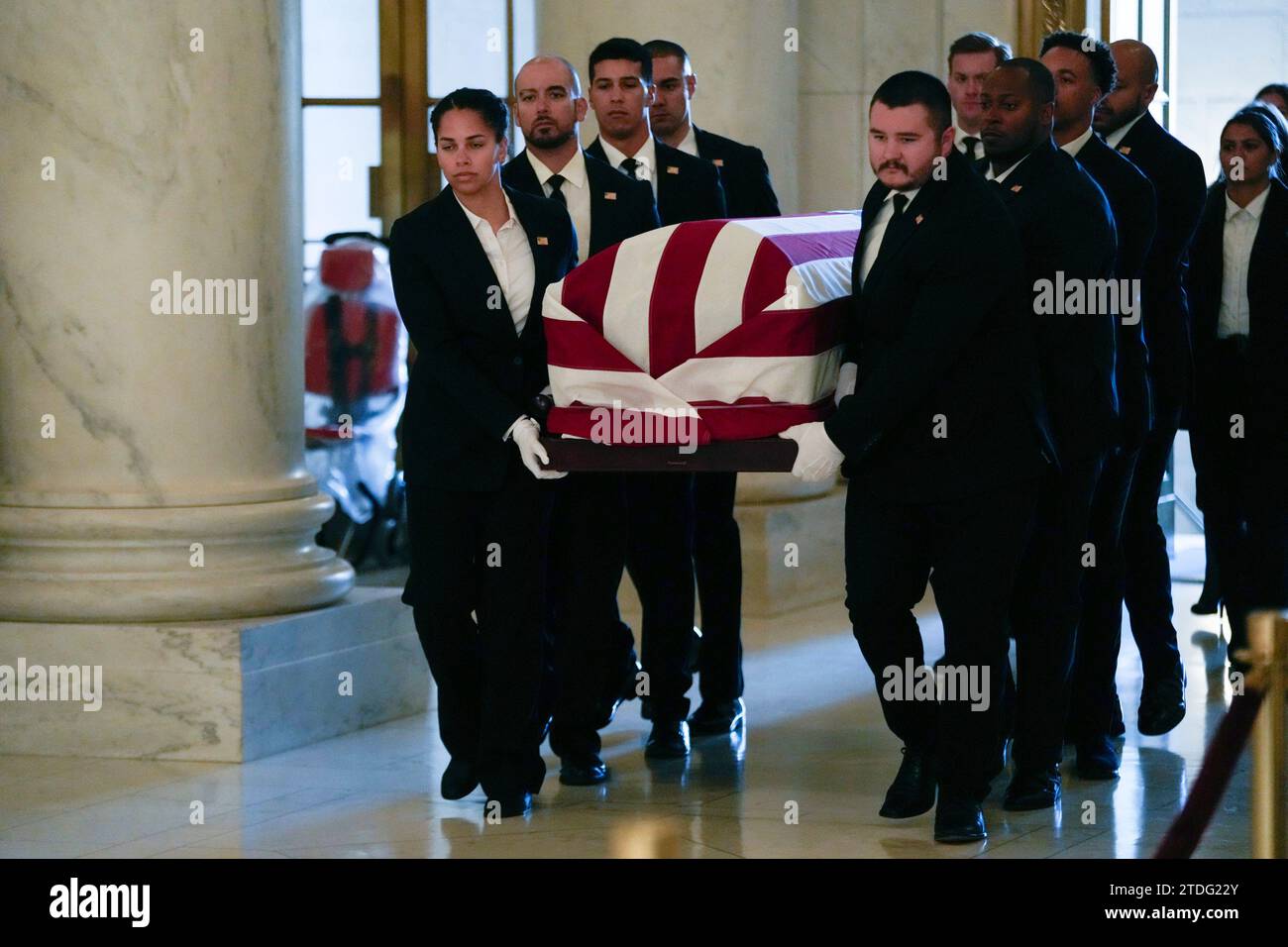 Washington, United States. 18th Dec, 2023. The flag-draped casket of ...