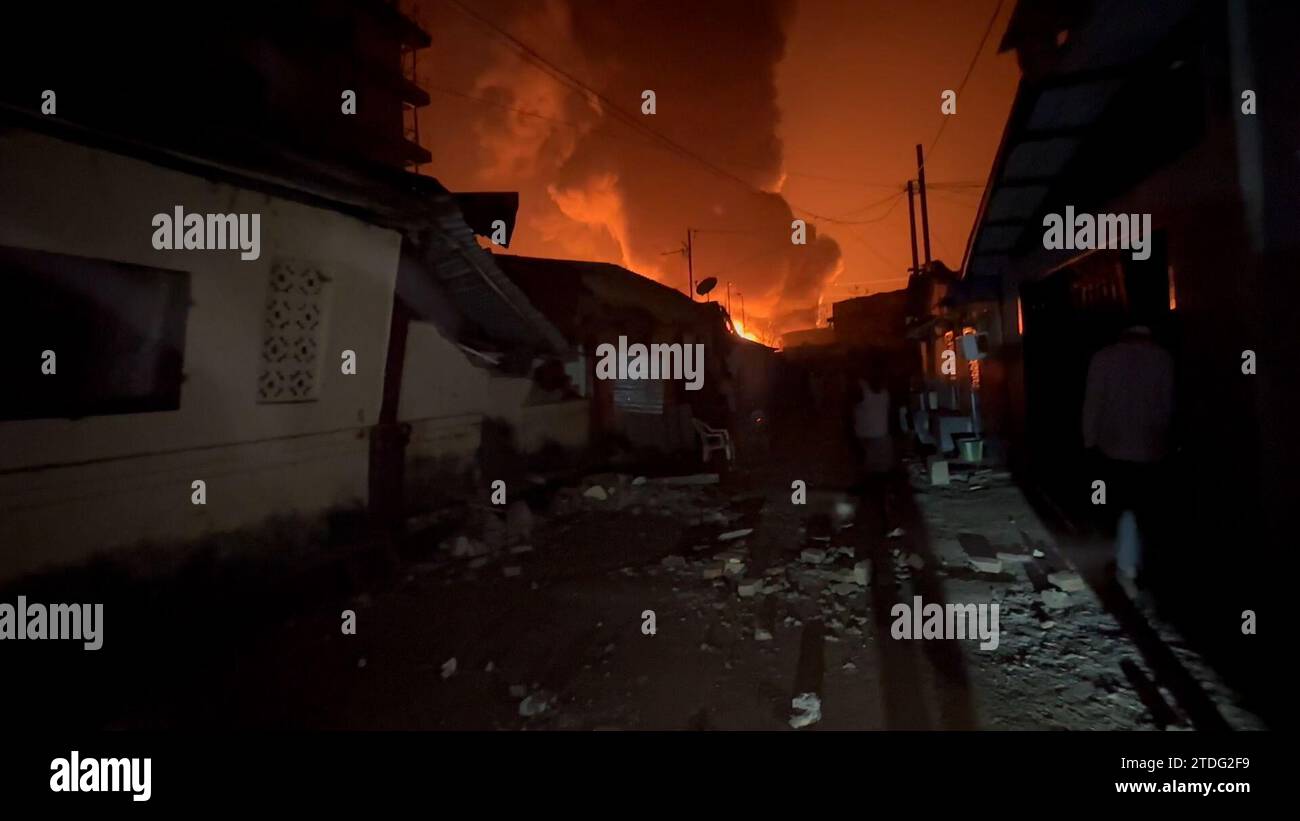 Conakry. 18th Dec, 2023. This photo taken on Dec. 18, 2023 shows fire ...