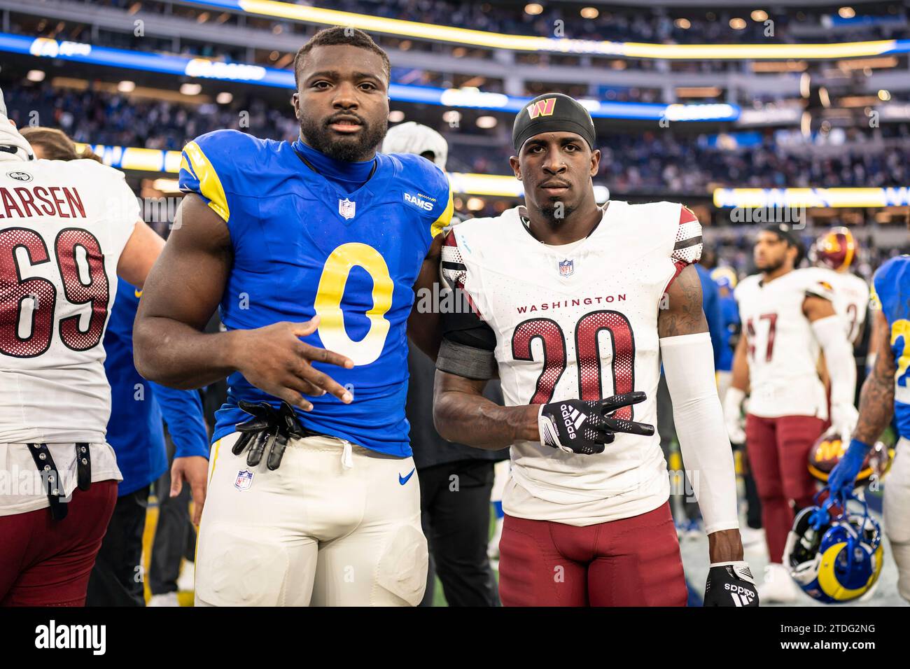 Los Angeles Rams linebacker Byron Young (0) and Washington Commanders ...