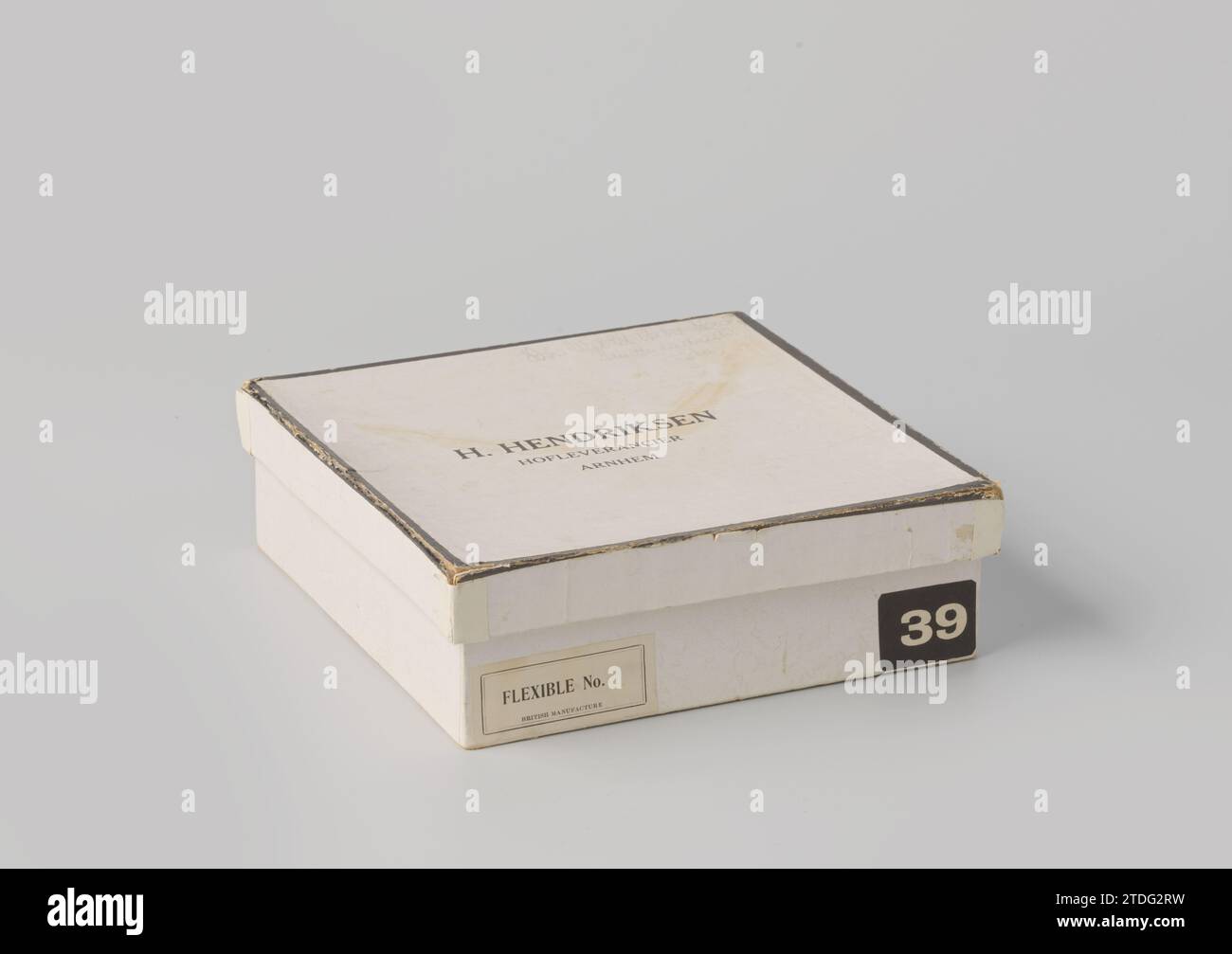 Square box of cardboard covered with white paper; The lid has black ...