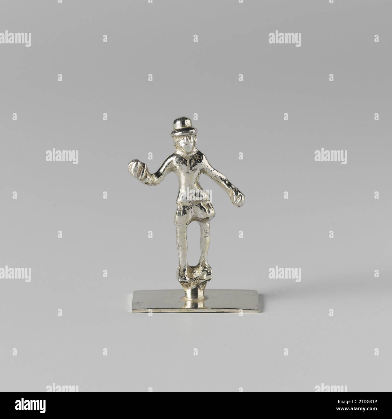 Acrobat, Anonymous, c. 1600 - c. 1700 On an elongated plate is an ...