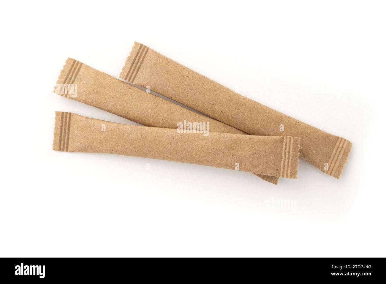 three sugar sticks, sugar in paper kraft packaging, mock up for design ...