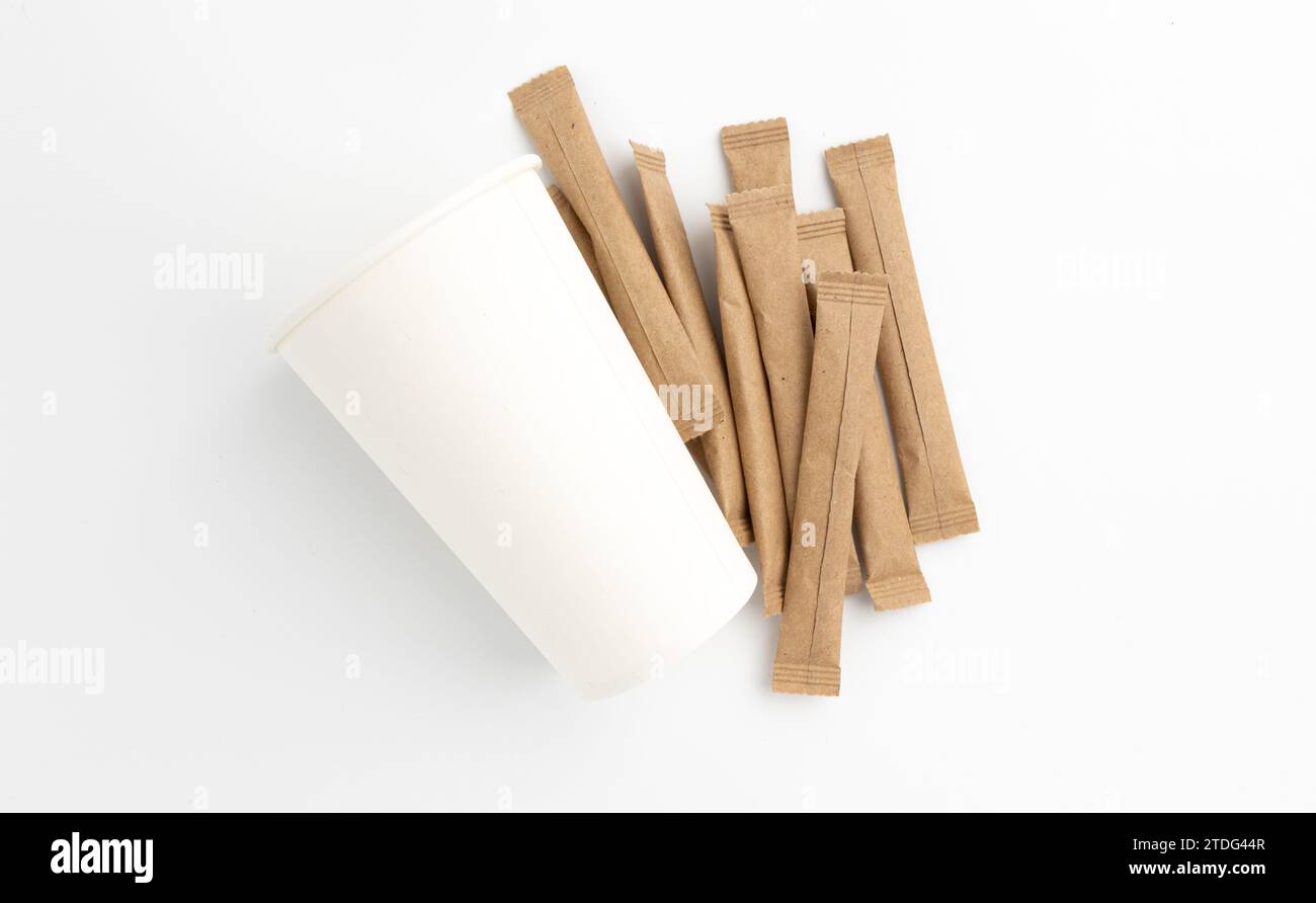 sugar sticks and paper cup, sugar in paper kraft packaging, mock up for ...