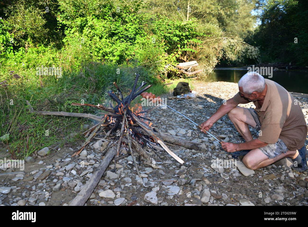 Marshmallow on a stick over a fire hi-res stock photography and images ...