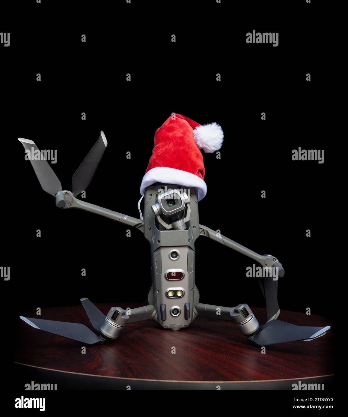 Portrait of a quadcopter drone wearing a santa hat as a Christmas ...
