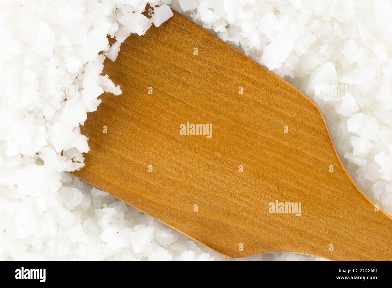 wooden ladle in white Sea Salt background , top view Stock Photo - Alamy