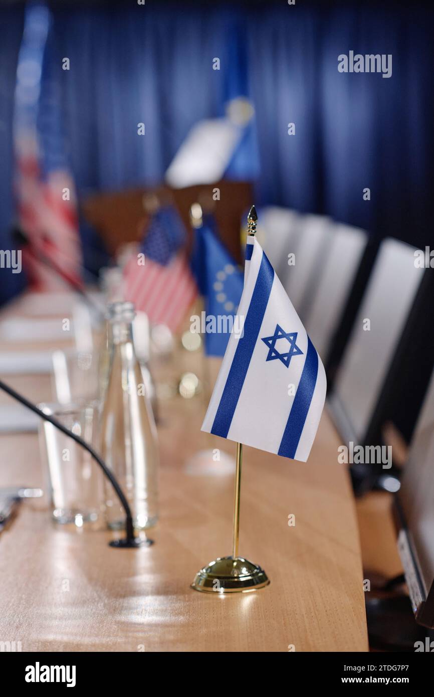 Vertical image of table with Israel flag and microphone preparing for ...