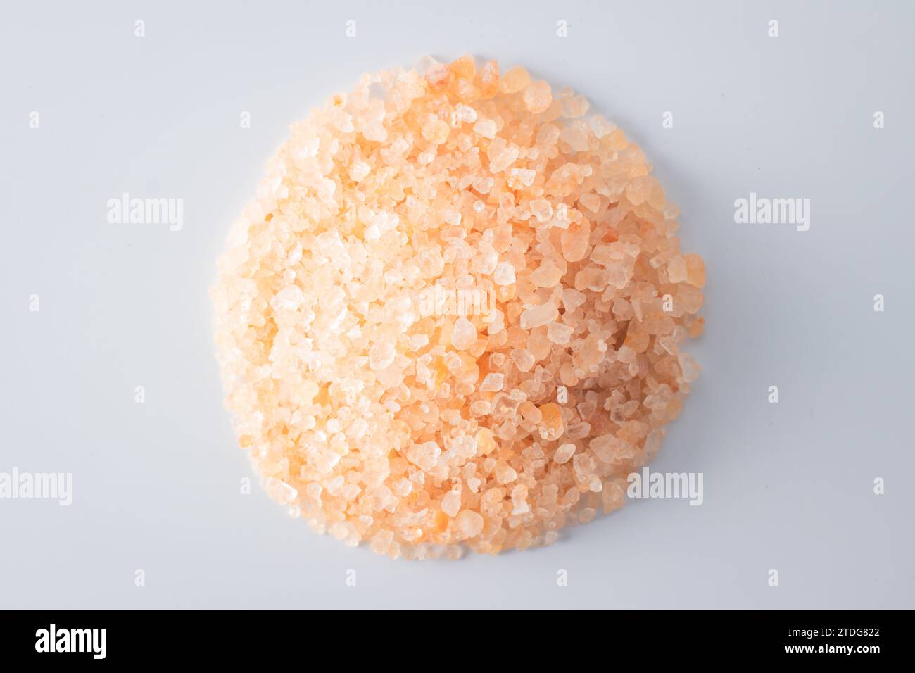 Himalayan Pink Salt piled up in circle shape isolated on white ...