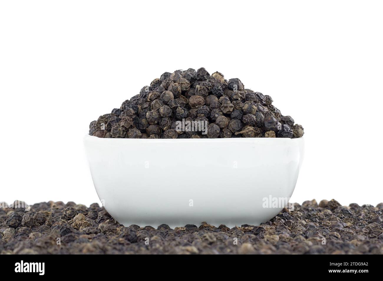 black peppercorns or black pepper in White bowl isolated on white ...