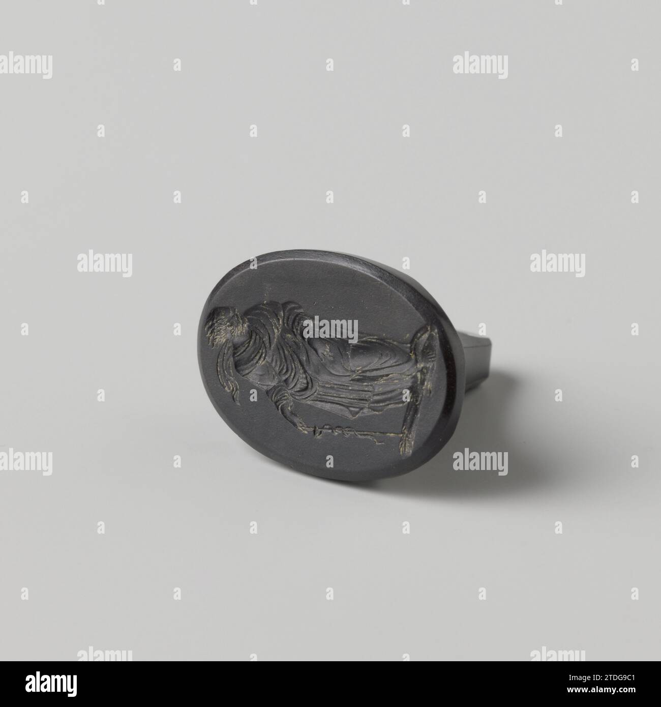 Seal stamp of black stoneware with a performance of Esculaap de Fabriek ...