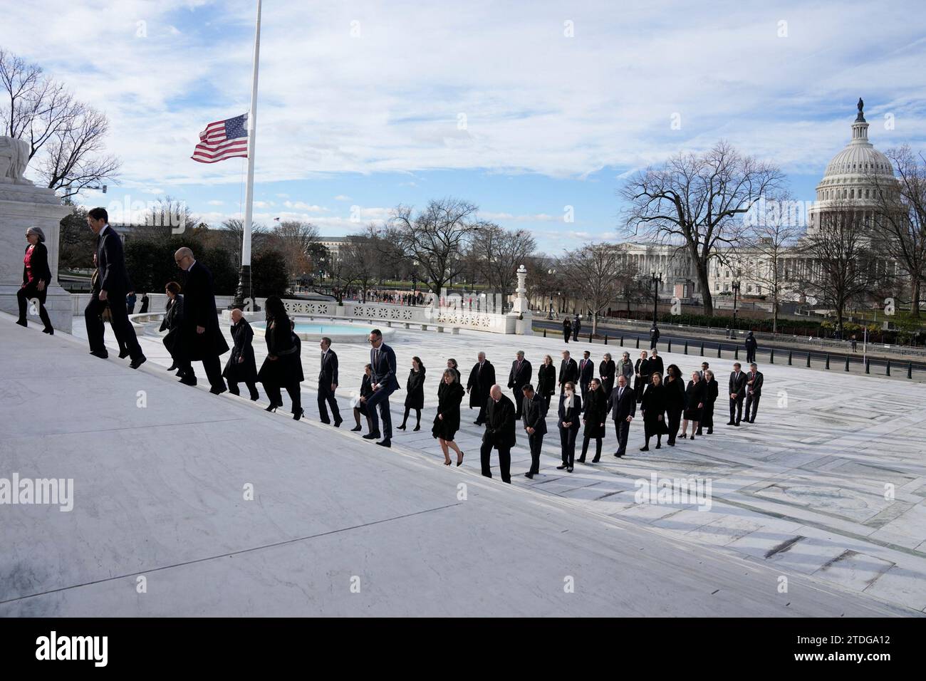 Washington, United States. 18th Dec, 2023. People walk up the steps of ...