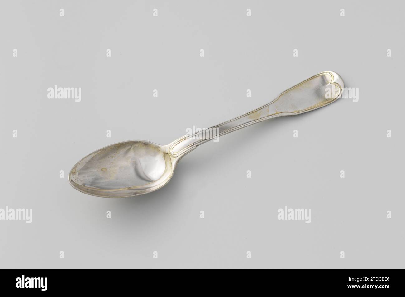 Spoon bent silver hi-res stock photography and images - Alamy