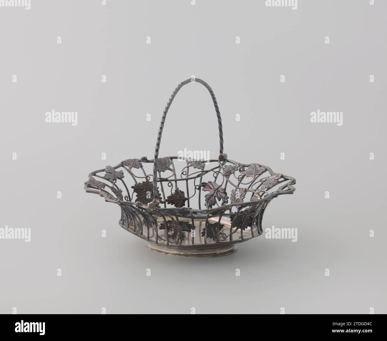 Handel basket of silver. Curbed from curved rods from the bottom and at ...