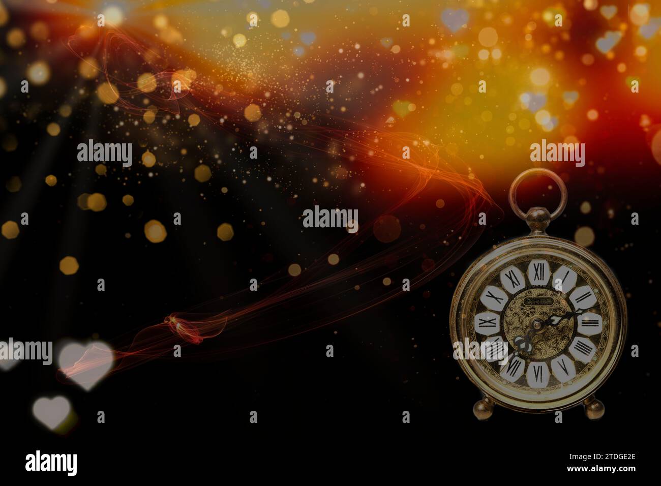 an old golden analog alarm clock with mechanical movement isolated on ...