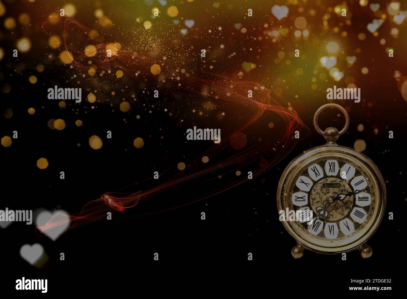 an old golden analog alarm clock with mechanical movement isolated on ...