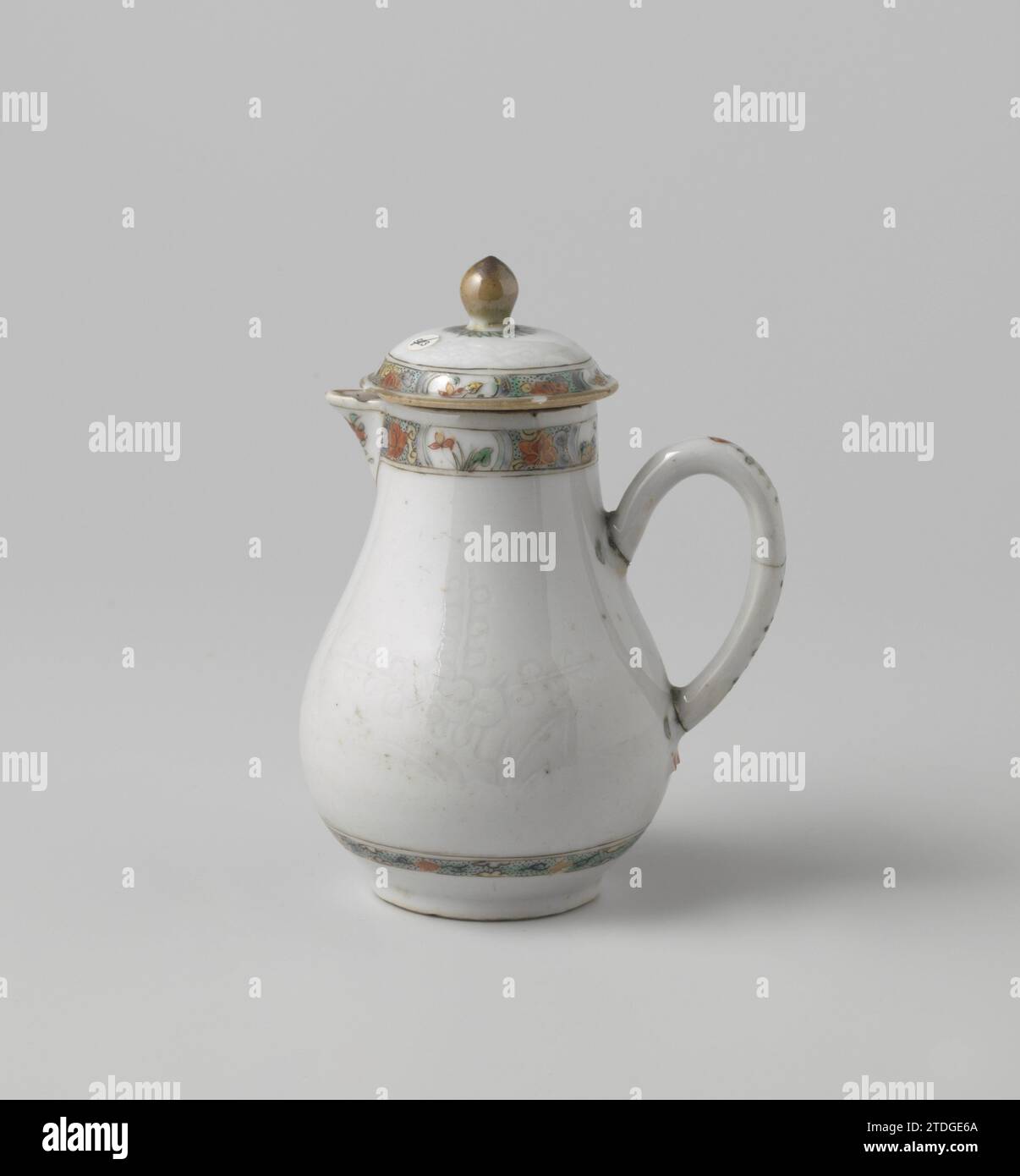 Milk jug with cover with onderglaze relief decoration with flowers ...