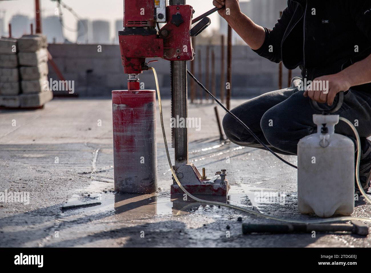 Drilling reinforced concrete floors with an automatic electric drilling ...