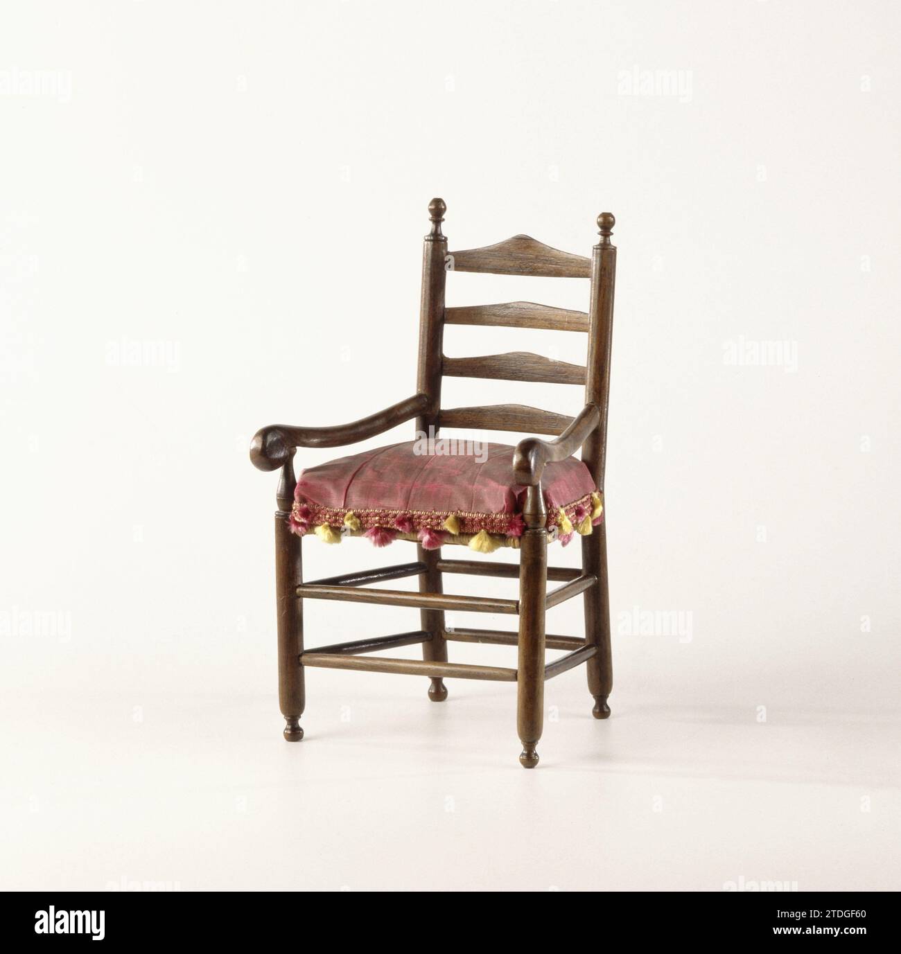 Arm chair (model button chair) of walnut with smooth, twisted styles ...