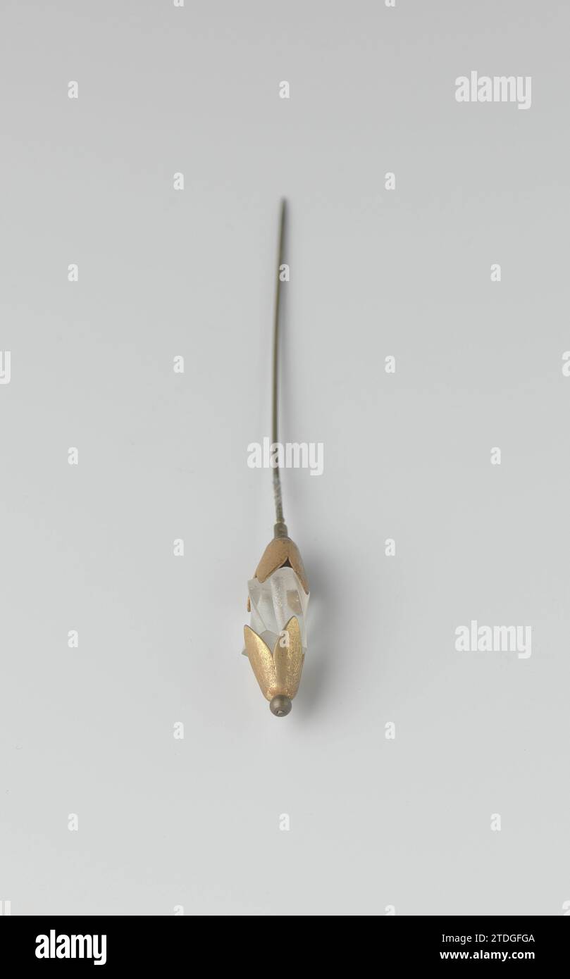 Metal hat pin with square block of glass with slanted sides, caught ...