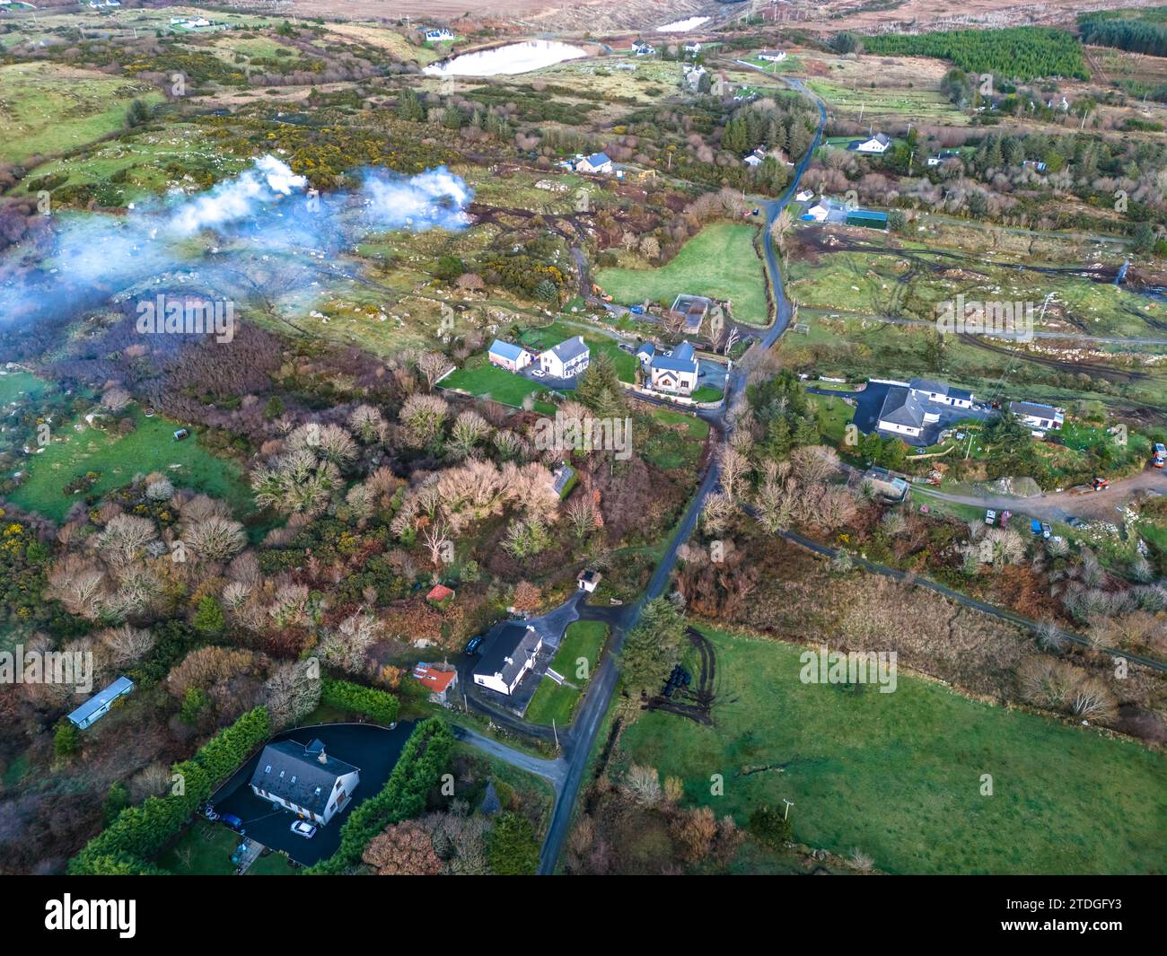 Smoke over Lough Fad due to traditionally burning of waste in rural ...