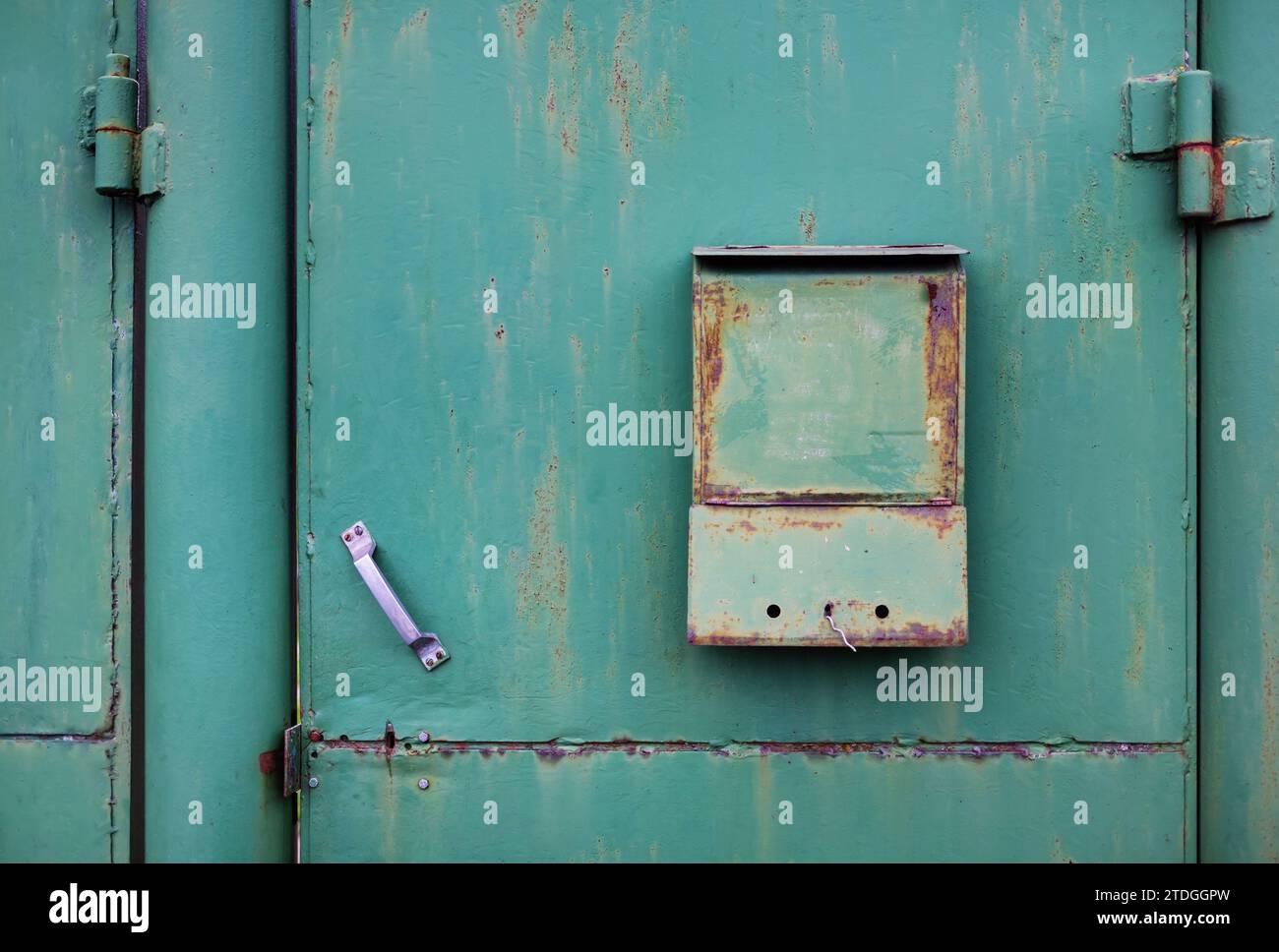 Old, painted in green mailbox in retro style Stock Photo - Alamy