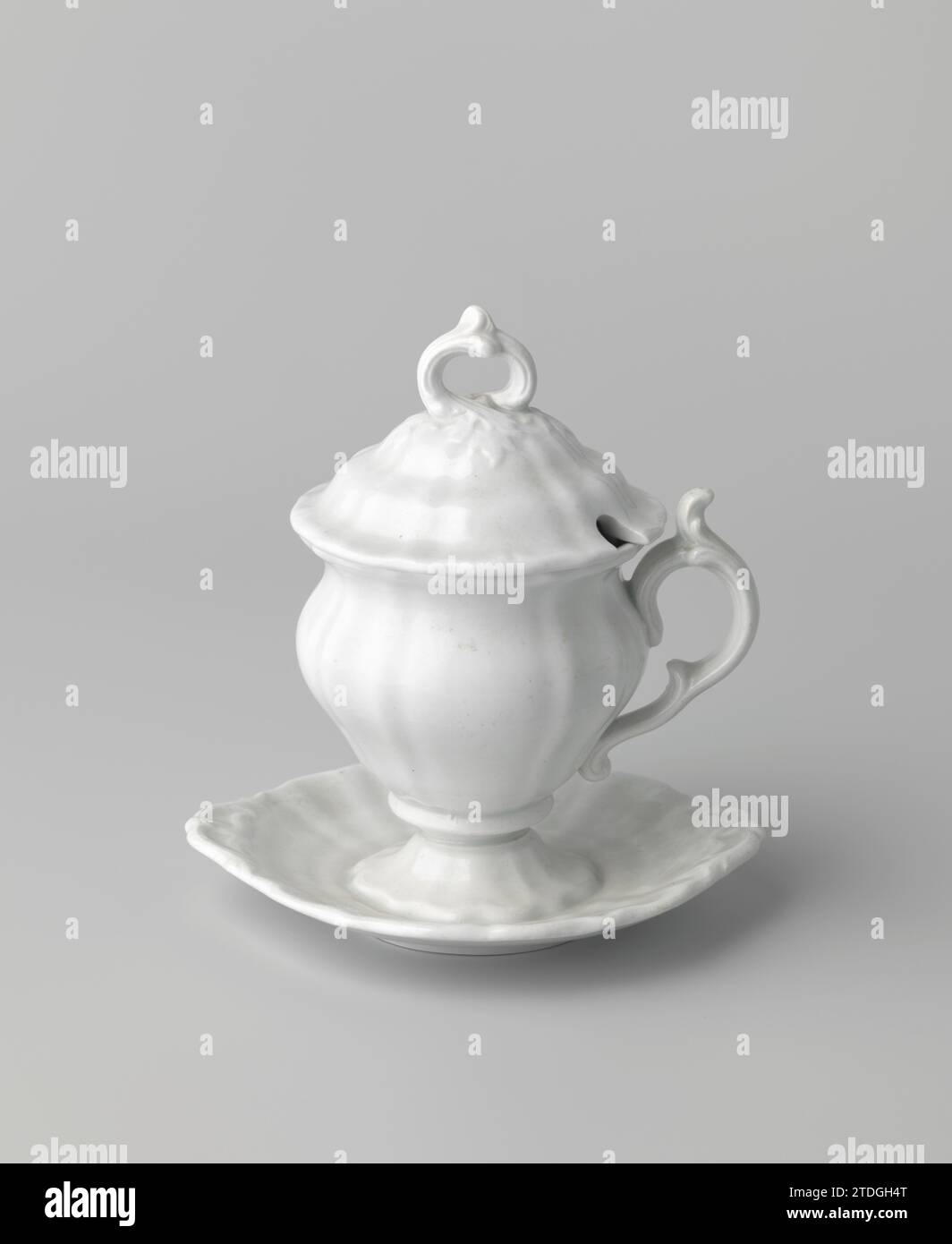Mustard pot on foot and with fixed underpot, white, Peter Regout, c ...