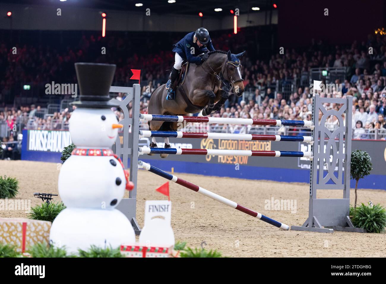 London, UK. 18th Dec, 2023. John Whitaker of Great Britain with Sharid ...