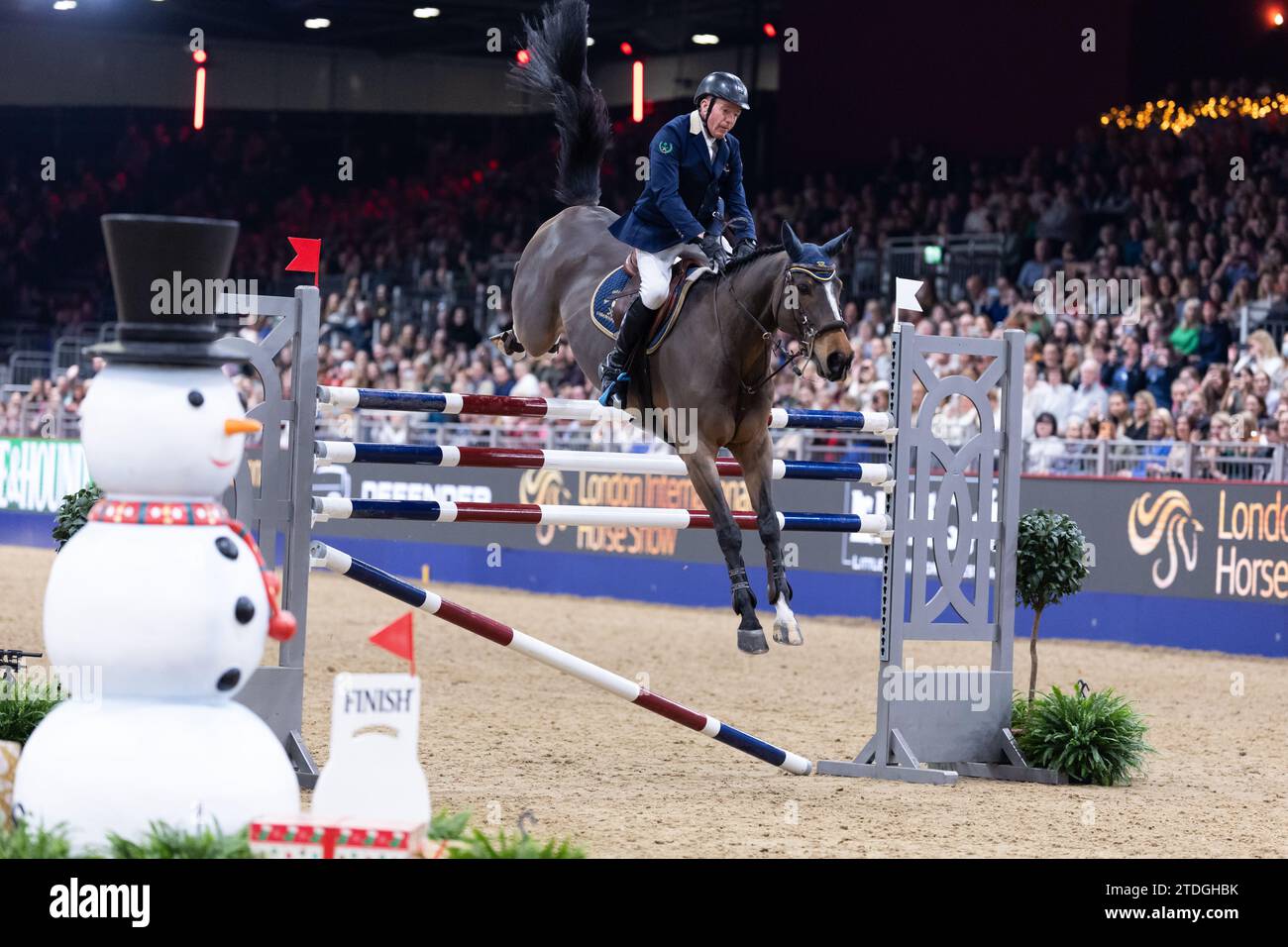 London, UK. 18th Dec, 2023. John Whitaker of Great Britain with Sharid ...